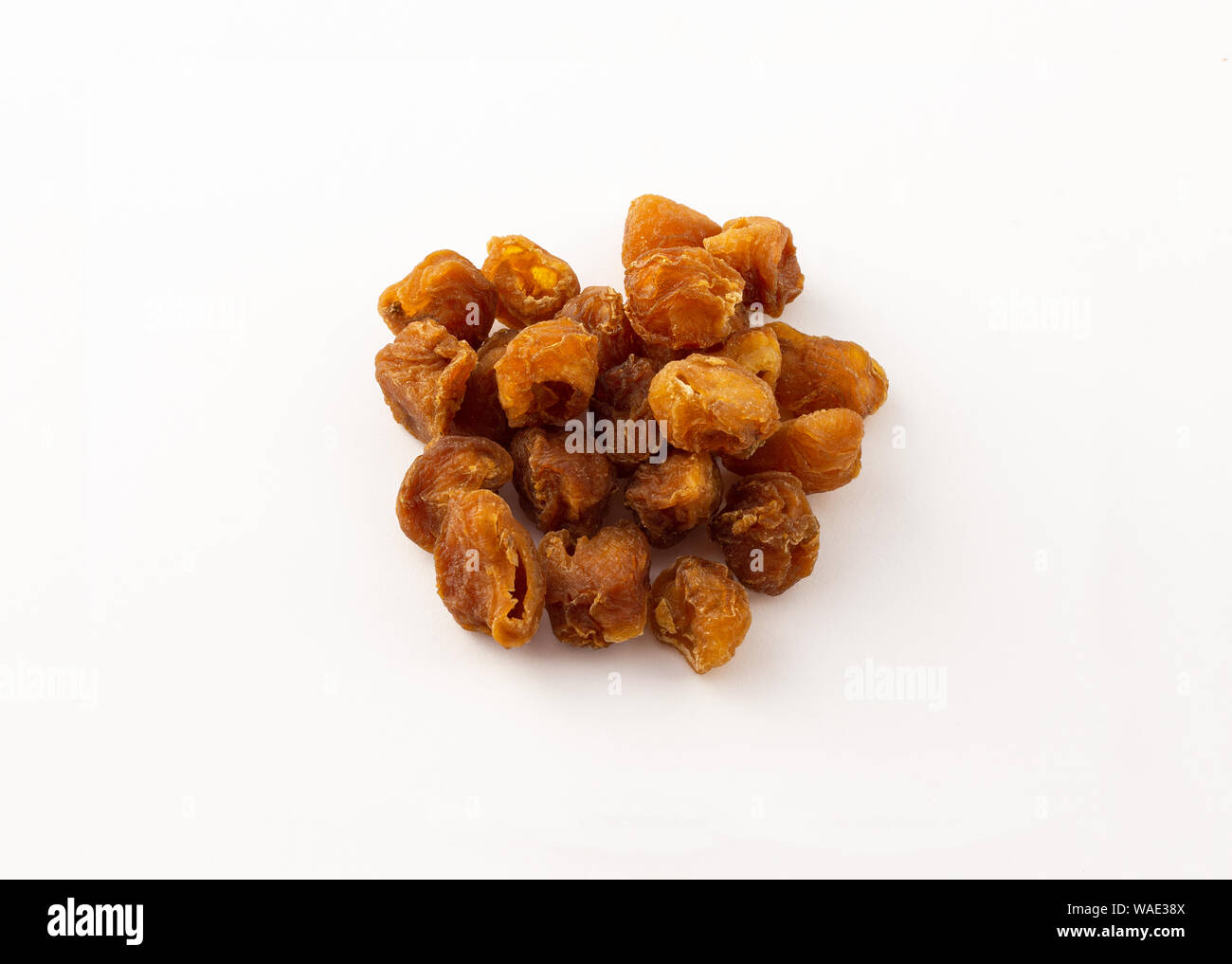 group of dried longan fruit on white background Stock Photo - Alamy