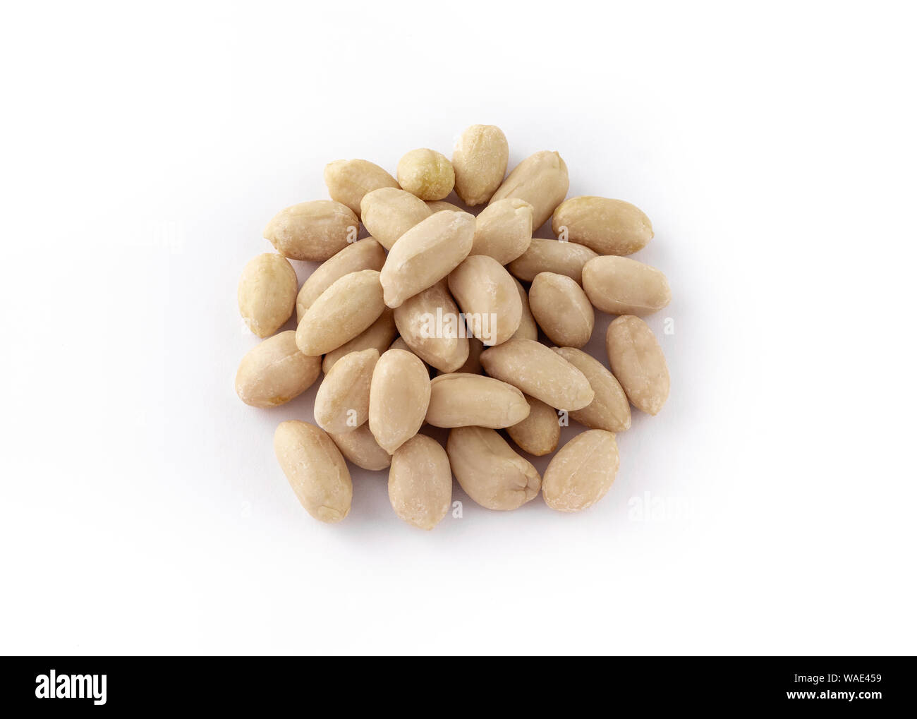 group of raw skinless peanuts on white background Stock Photo - Alamy