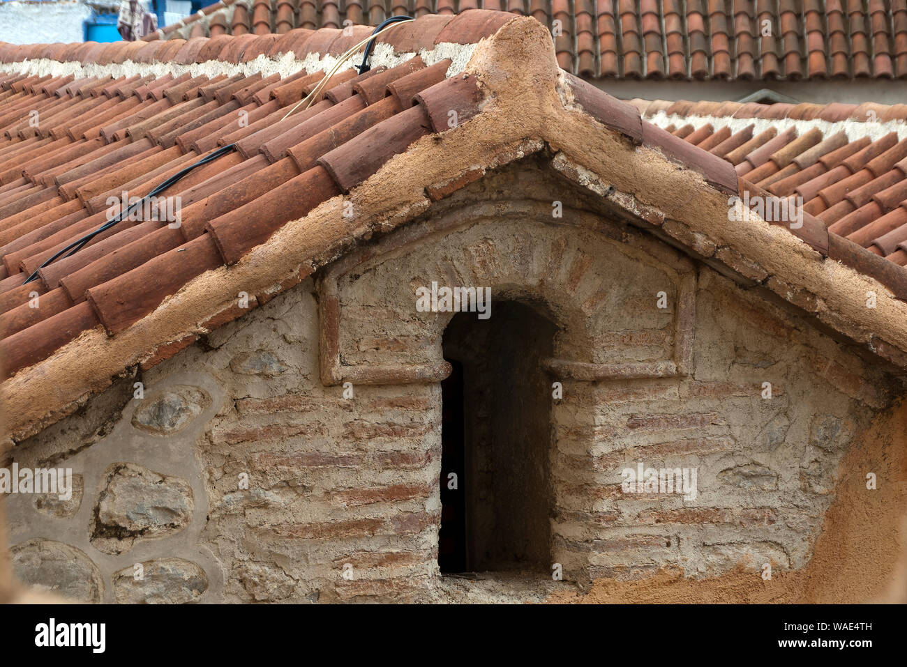Chefchaouen Morocco, traditional mud brick building with tile roof ...