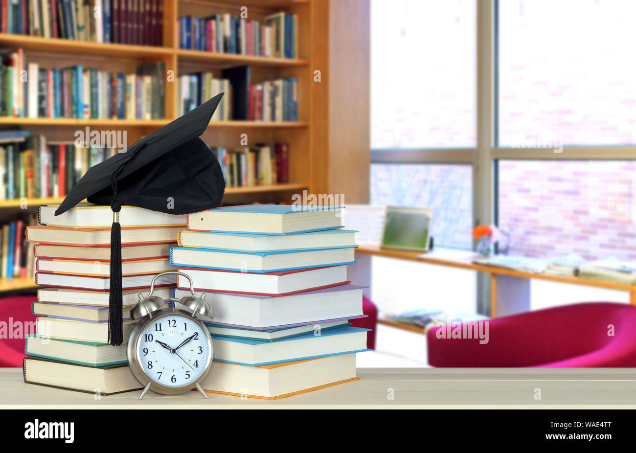blurry background of a corner of library with book in the front for ...
