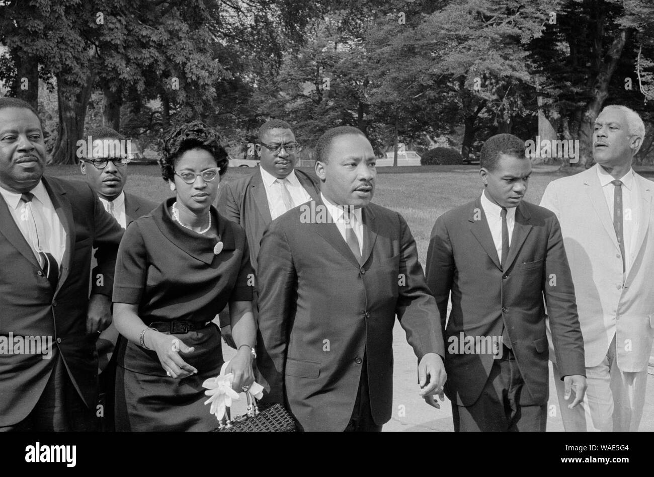 Martin Luther King Jr. walks to a meeting with President Lyndon B ...
