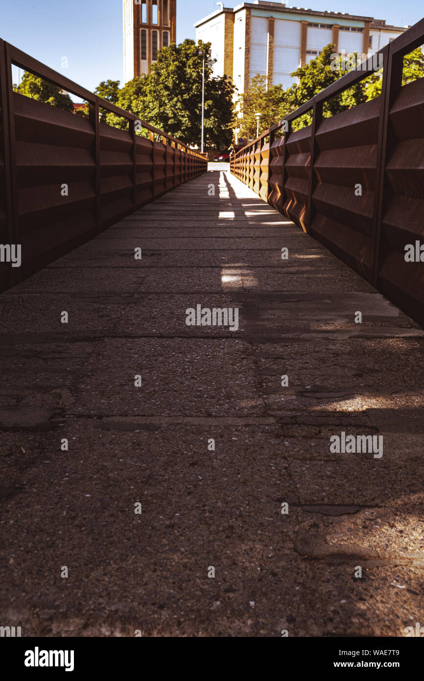 Straight narrow pedestrian bridge architecture detail Stock Photo - Alamy
