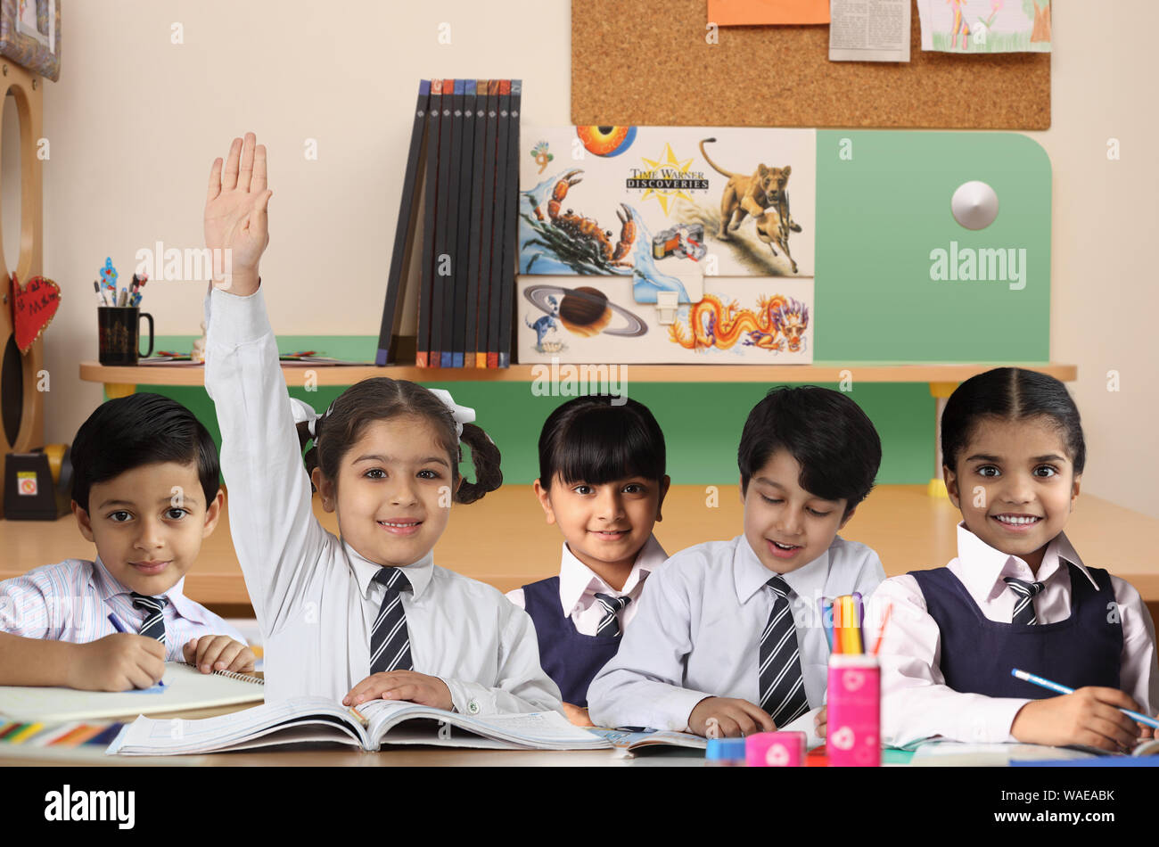 School children studying in a classroom Stock Photo - Alamy