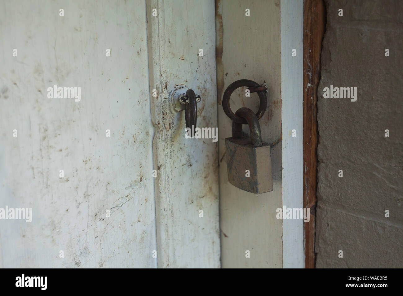 old lock on wooden door Stock Photo - Alamy
