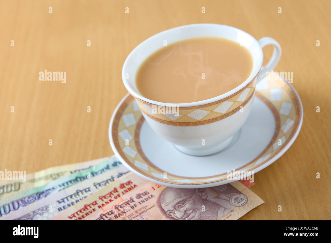 Tip the cup hi-res stock photography and images - Alamy
