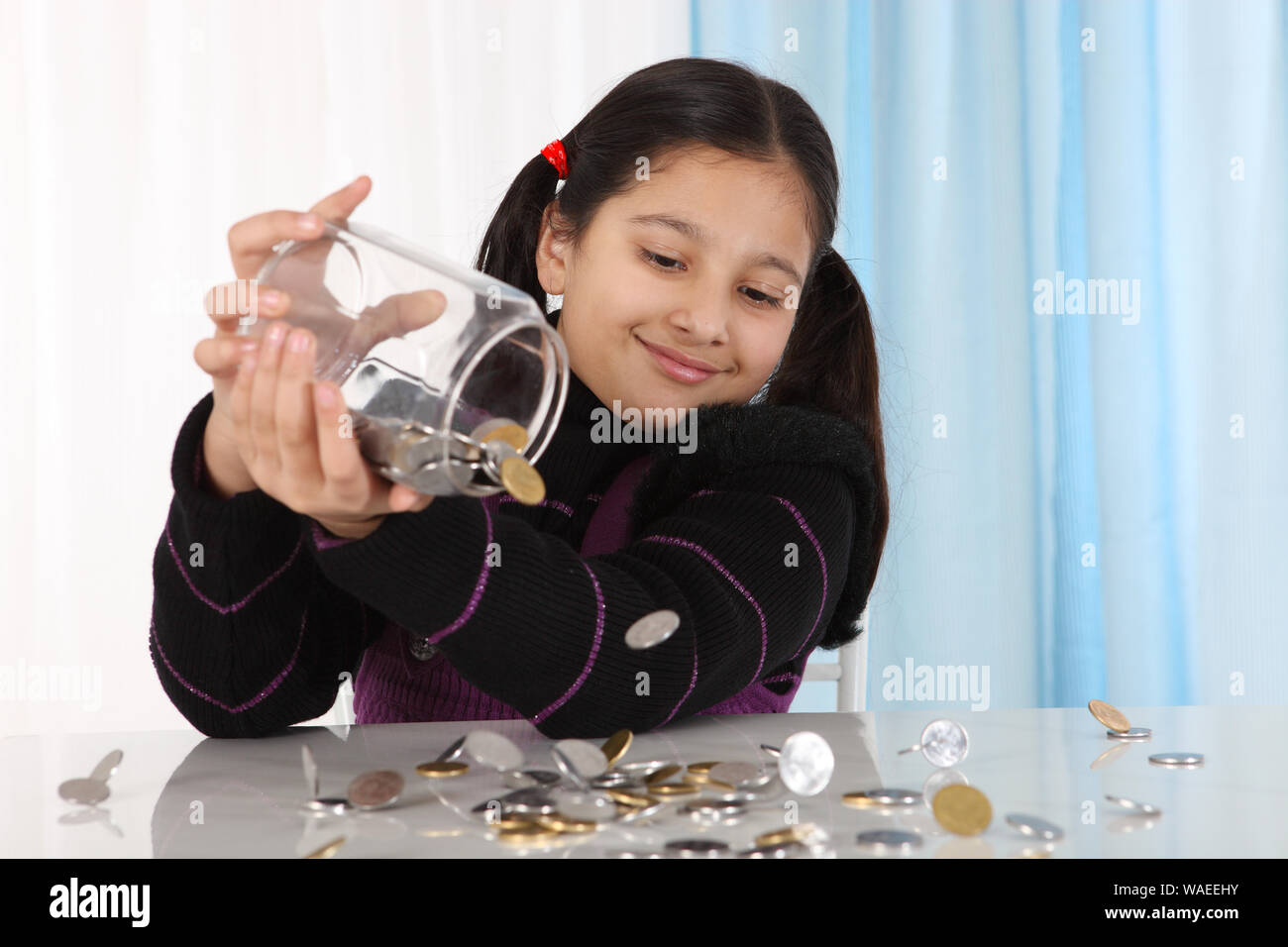 Asian girl holding jar hi-res stock photography and images - Alamy