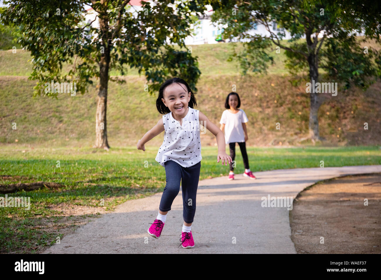 Chinese kids running hi-res stock photography and images - Alamy