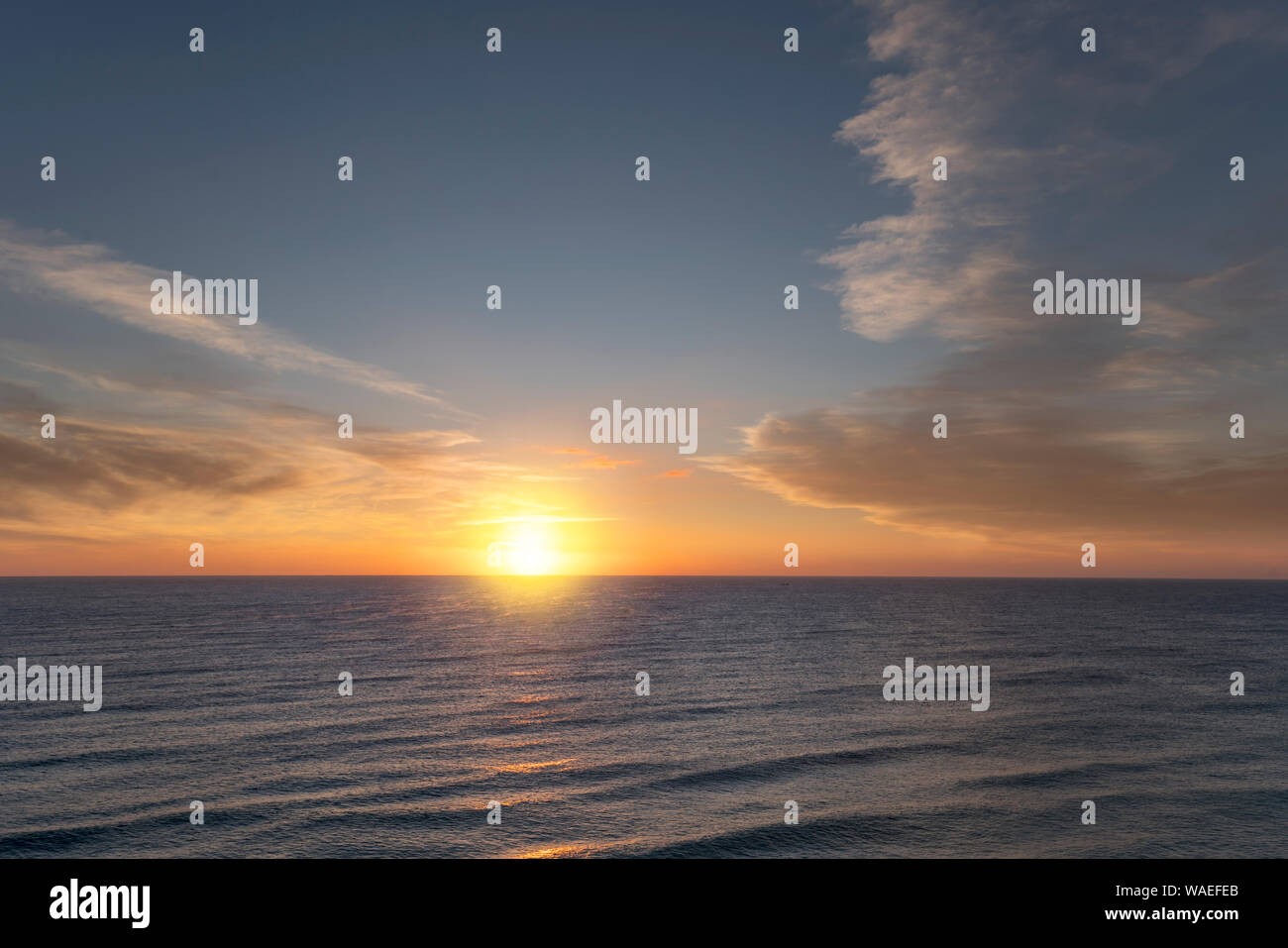 SUNRISE OVER SEA Stock Photo - Alamy