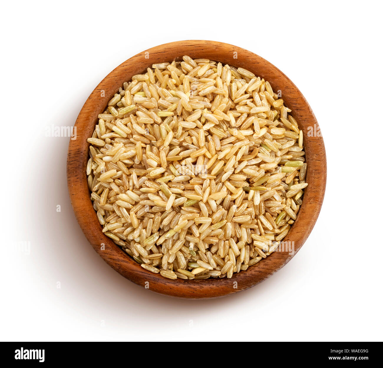 Brown rice groats isolated on white background, top view Stock Photo ...