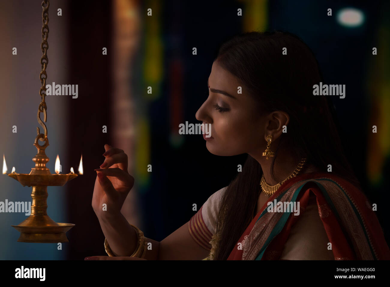 Woman with a lamp hi-res stock photography and images - Alamy