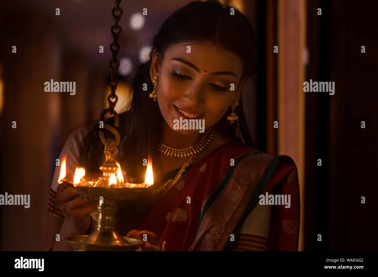 Woman with a lamp hi-res stock photography and images - Alamy