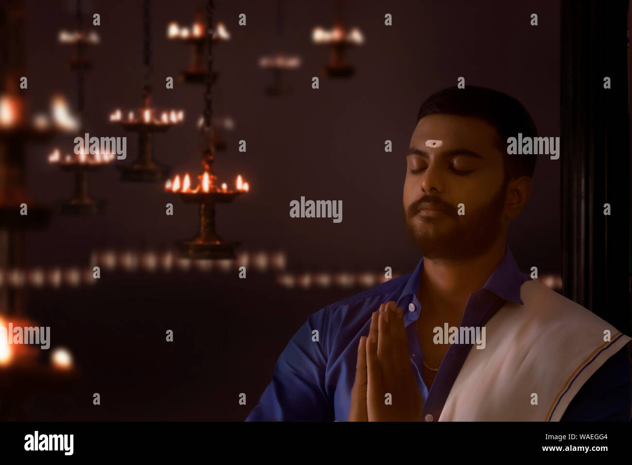 south indian man praying to god Stock Photo - Alamy