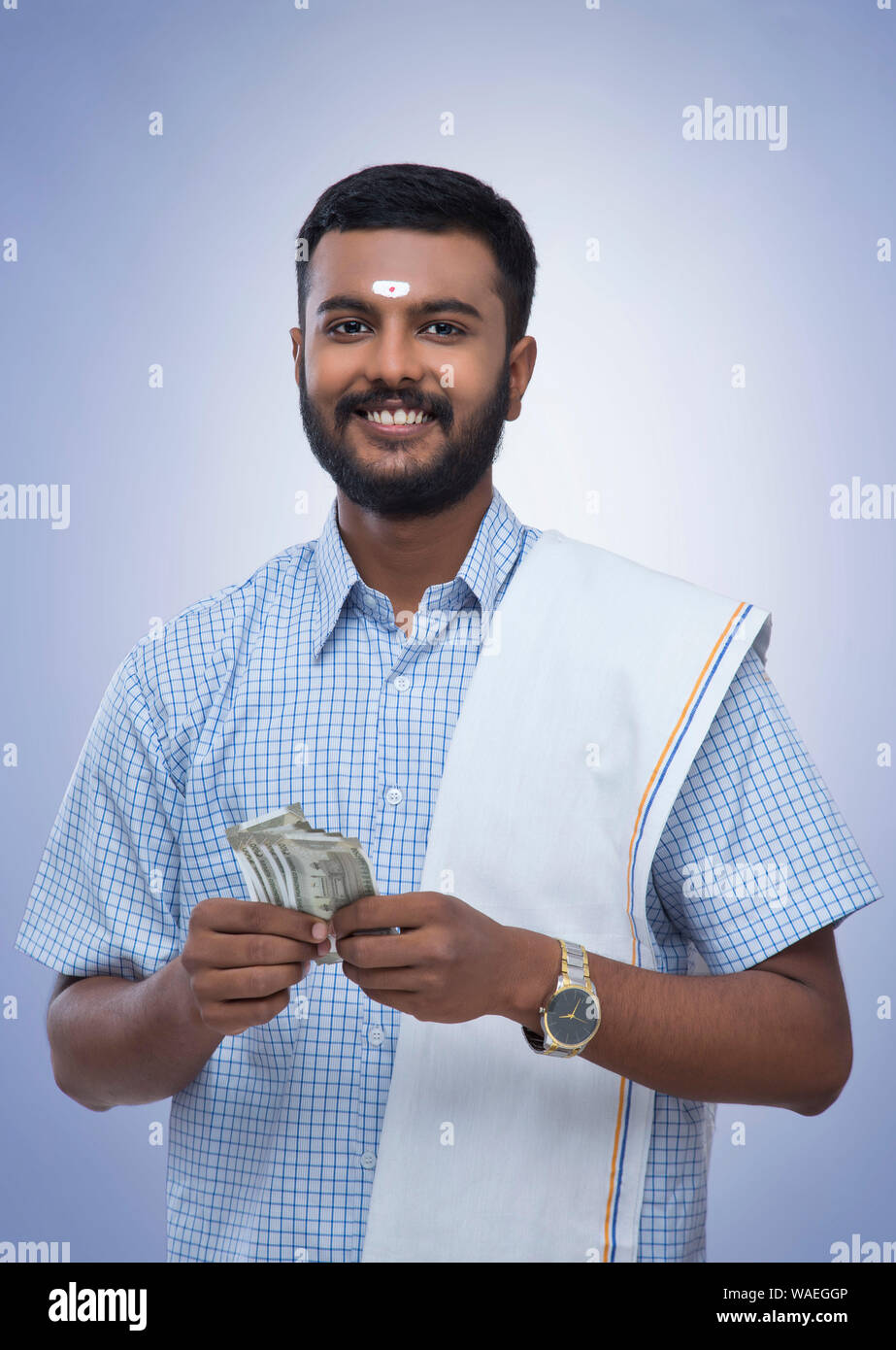 Happy smiling indian man holding indian money hi-res stock photography ...