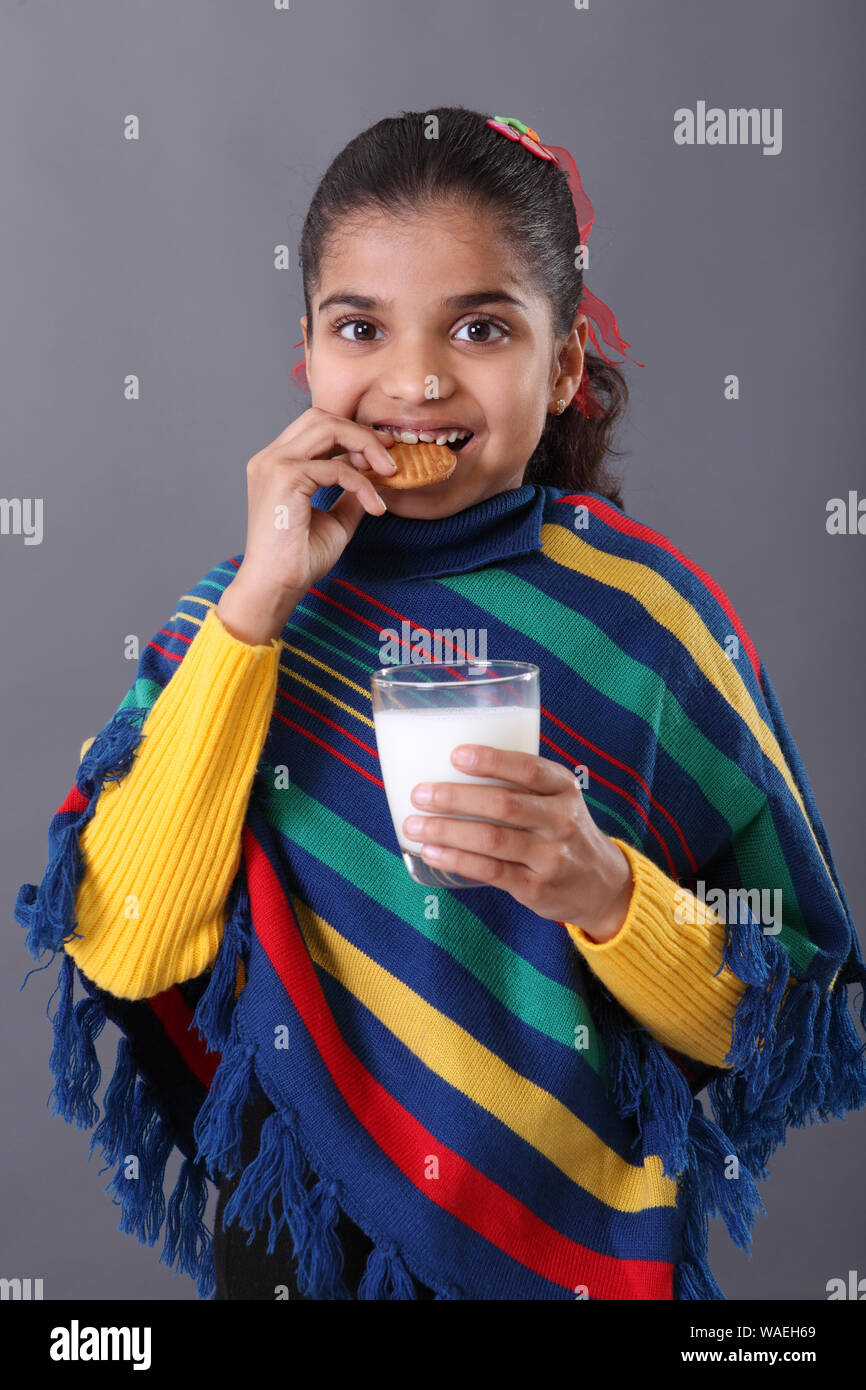 Indian girl writing in notebook hi-res stock photography and images - Alamy