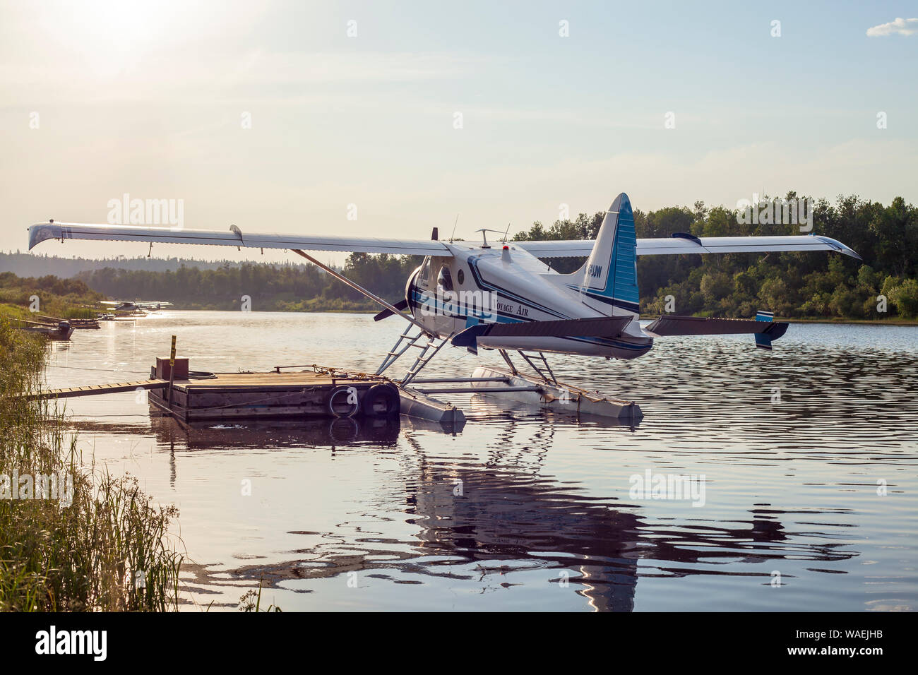 de Havilland Beaver float plane docked at the Sny river, adjacent to ...