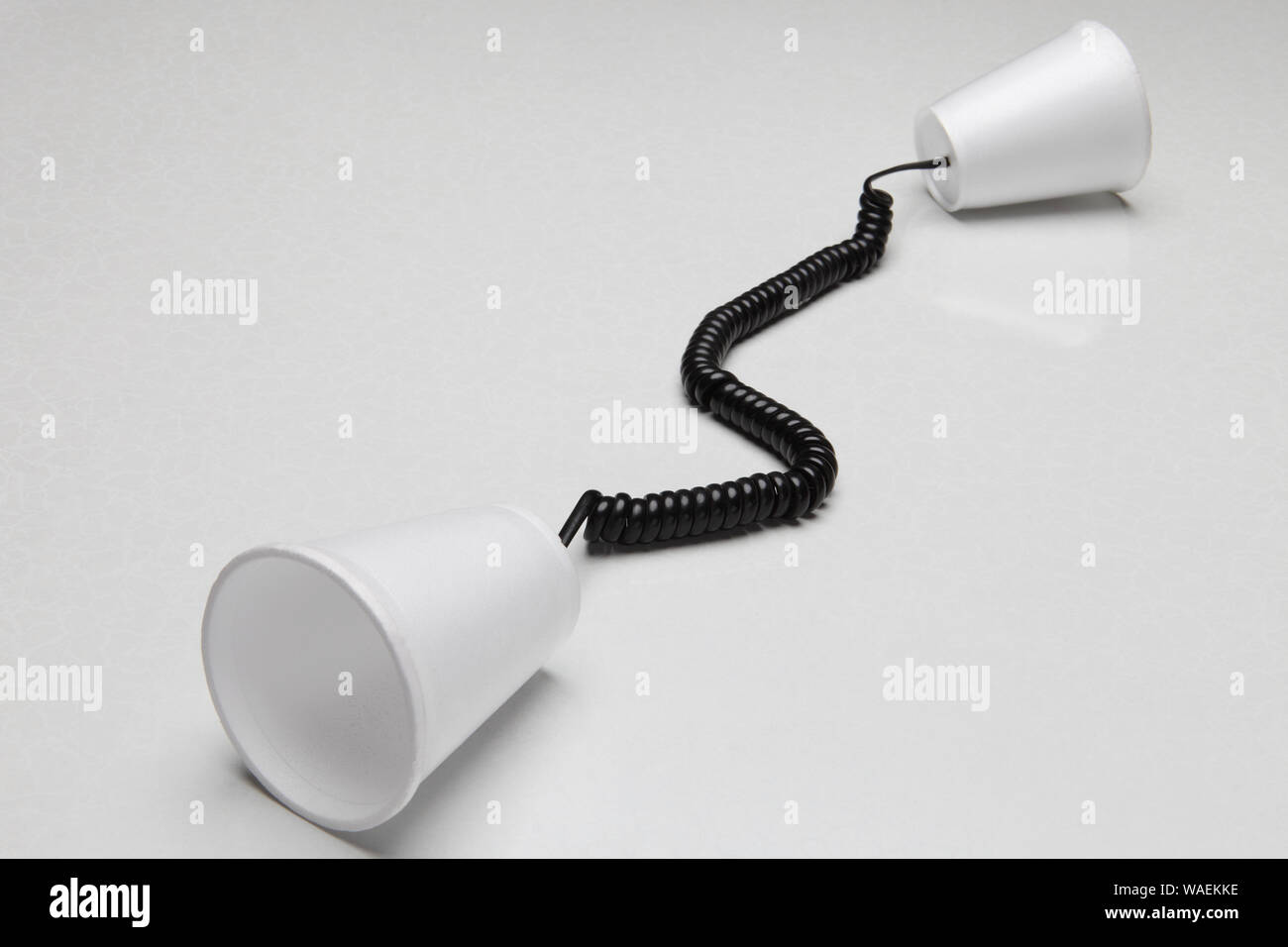 Communication concept "Tin Can Phone Stock Photo - Alamy