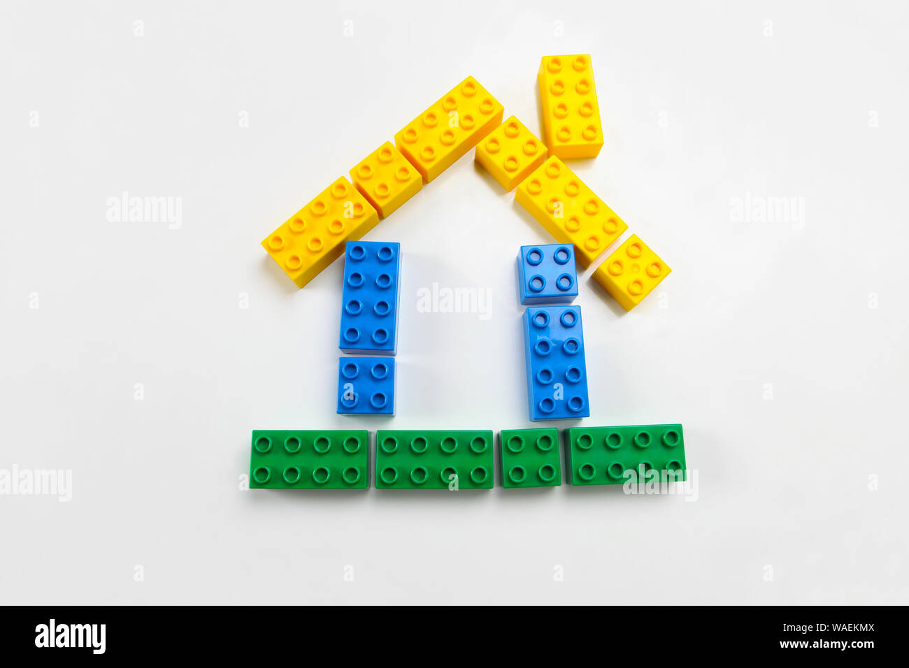 Dream home making with building blocks Stock Photo - Alamy