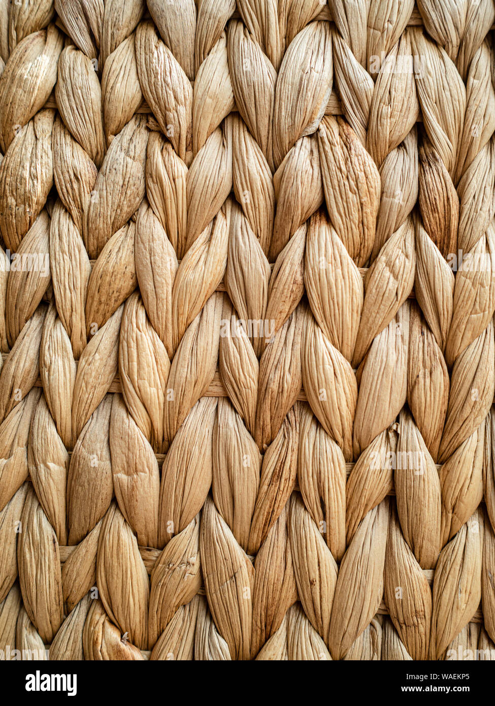 Light brown heavily textured abstract background of raffia wicker Stock ...