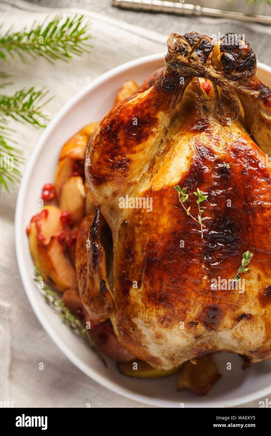 Whole stuffed and roasted chicken for a festive dinner. Christmas ...