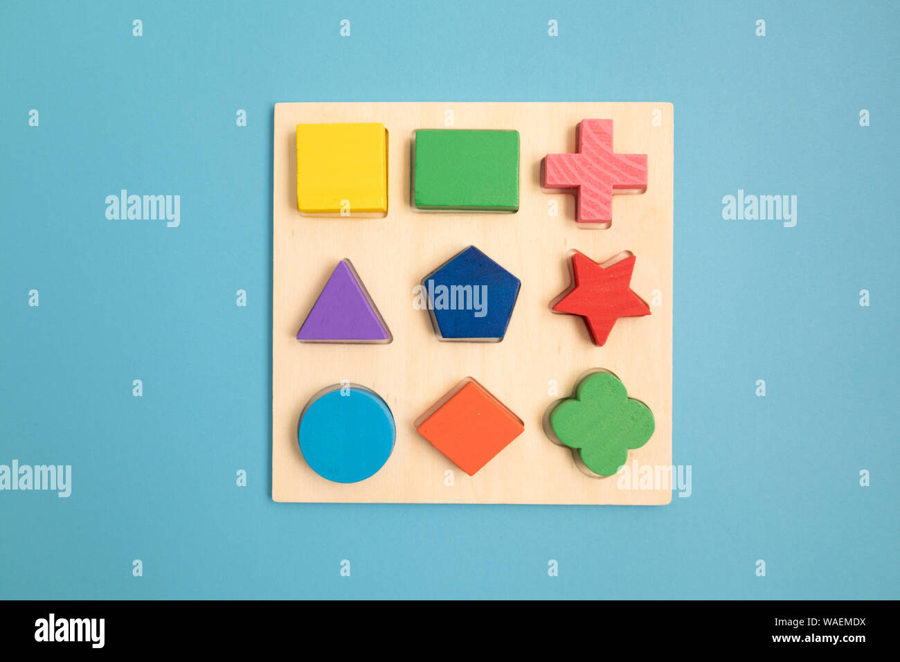 Top view Colorful Wooden building blocks with different shapes for ...