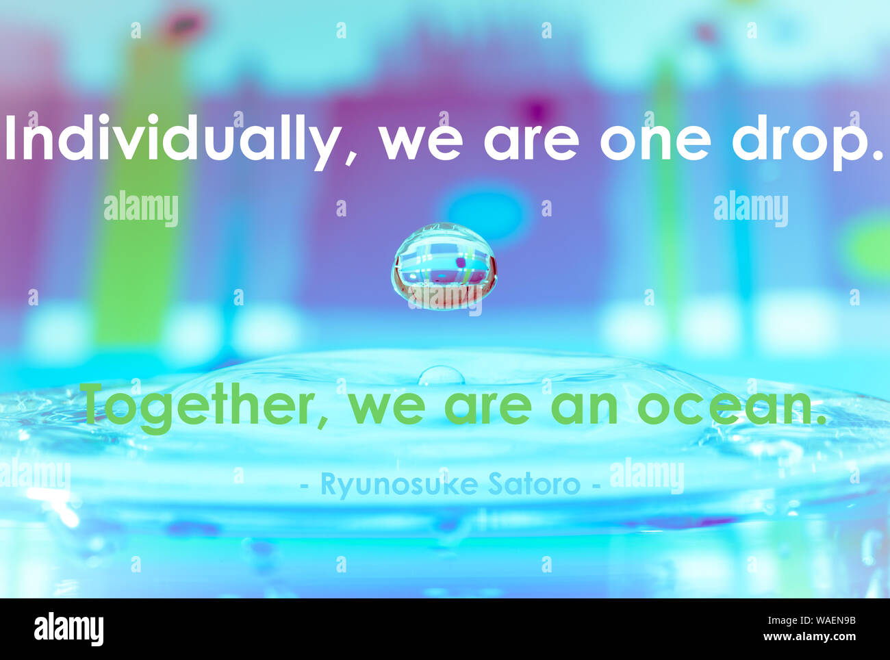 Falling water drop on ocean blue background Stock Photo - Alamy