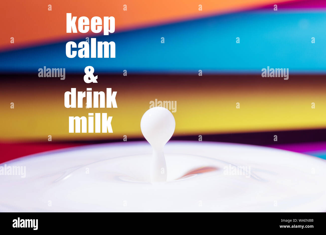 Fresh milk droplet isolated on interesting colourful background - dairy ...