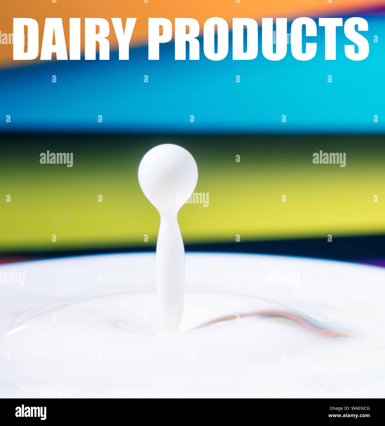 Fresh milk droplet isolated on interesting colourful background - dairy ...