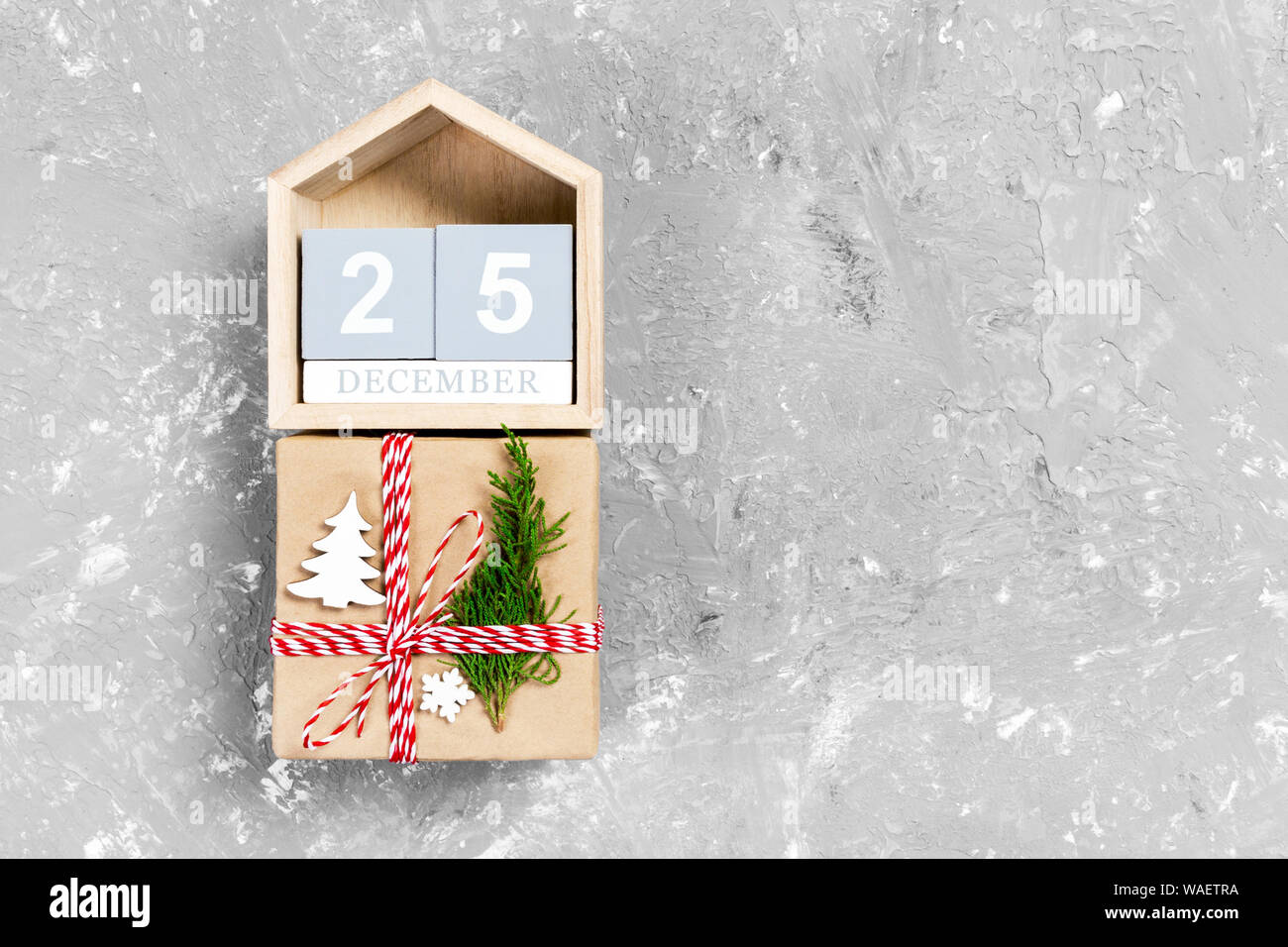 Calendar with date 25 december and gift boxes on color background ...