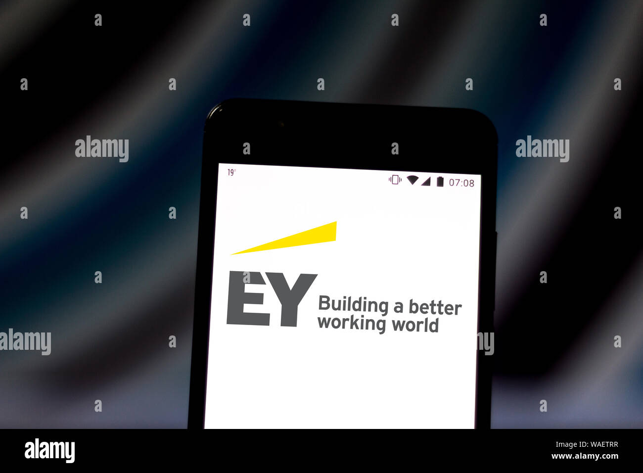 In this photo illustration the Ernst & Young (EY) logo is displayed on ...