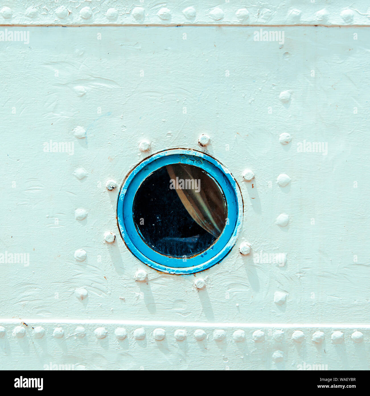 Round porthole on white board of ship Stock Photo - Alamy