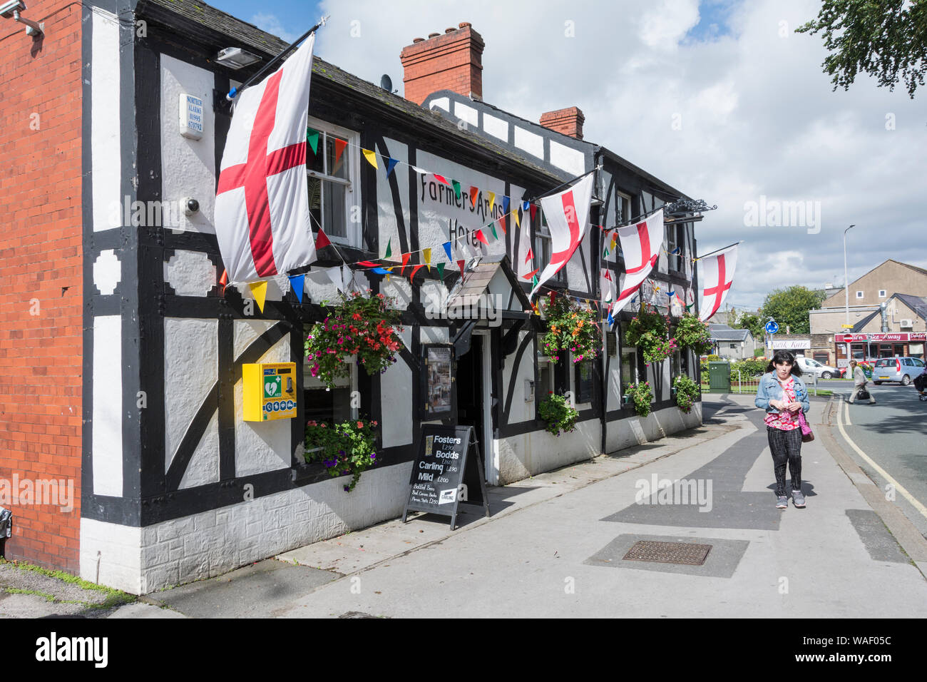 Flags of the Cross of St George adorning the Farmers Arms public house ...