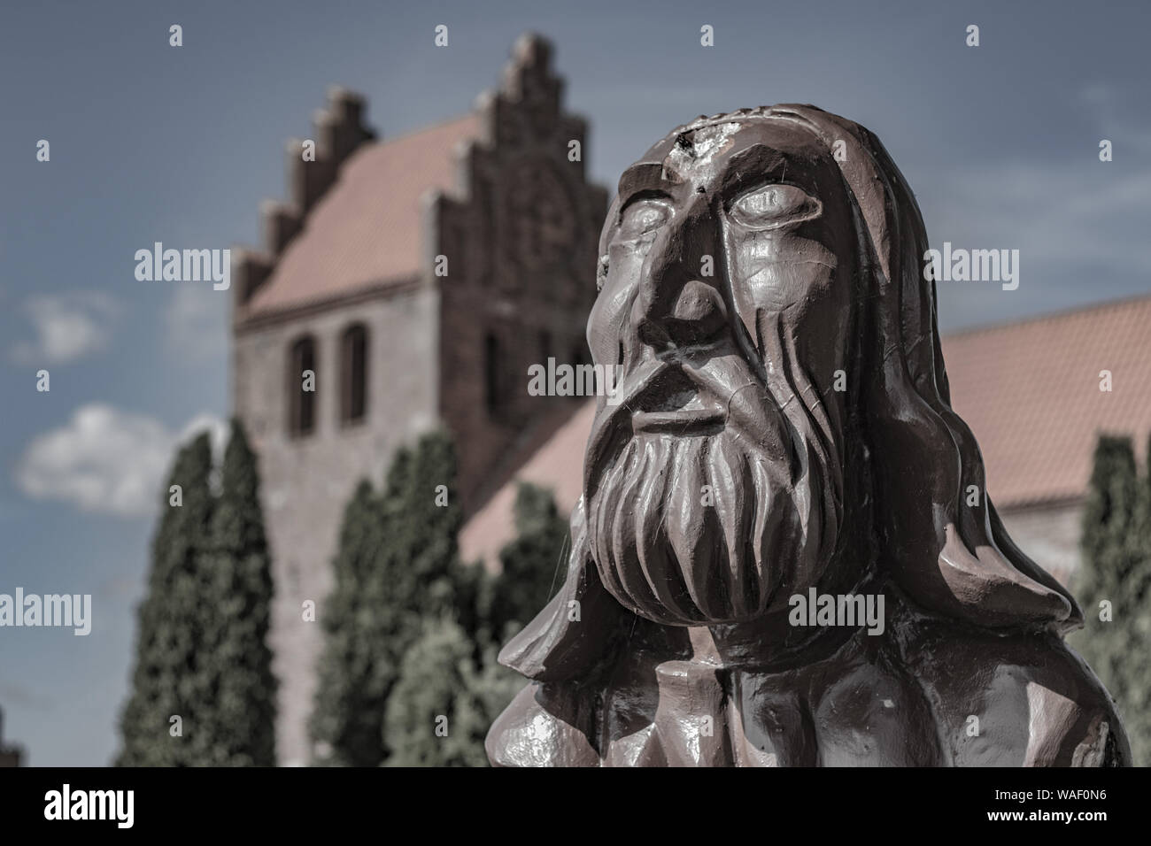 Religious statue at rural medieval church in Denmark Stock Photo - Alamy