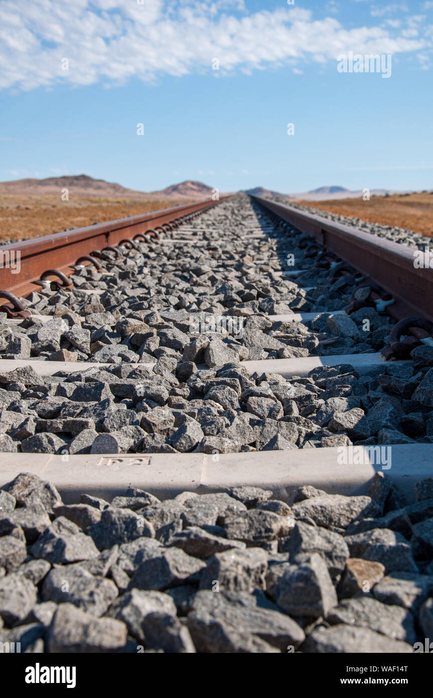Portrait image of the Trans Namib rail lines at Haalenberg, Namibia ...