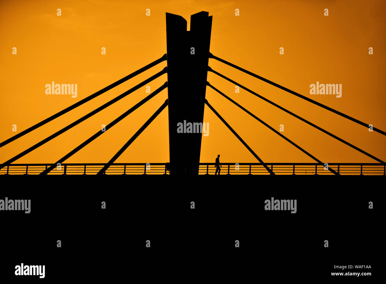 Book Cover Art - Man on a bridge Stock Photo - Alamy