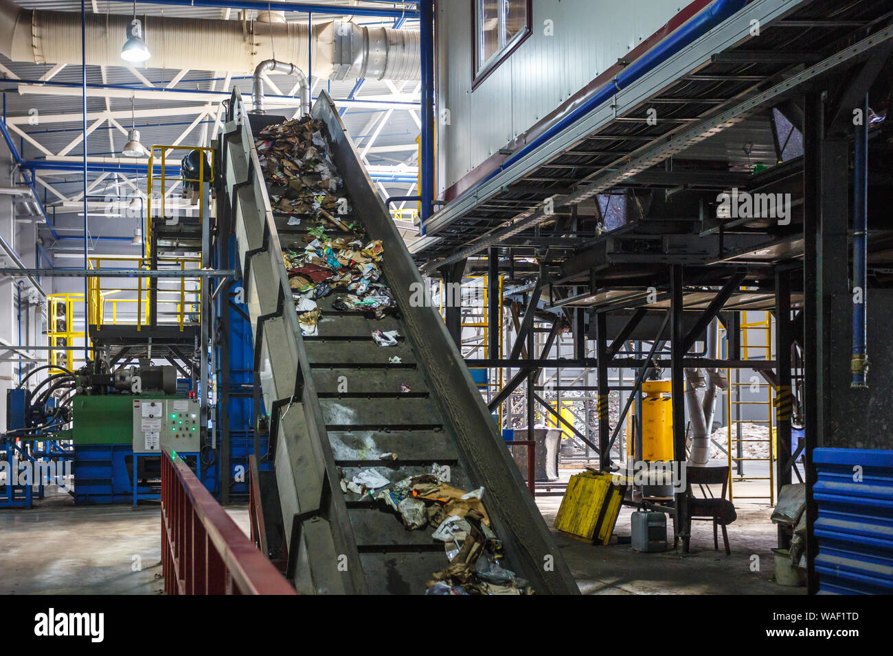 moving conveyor transporter on Modern waste recycling processing plant ...