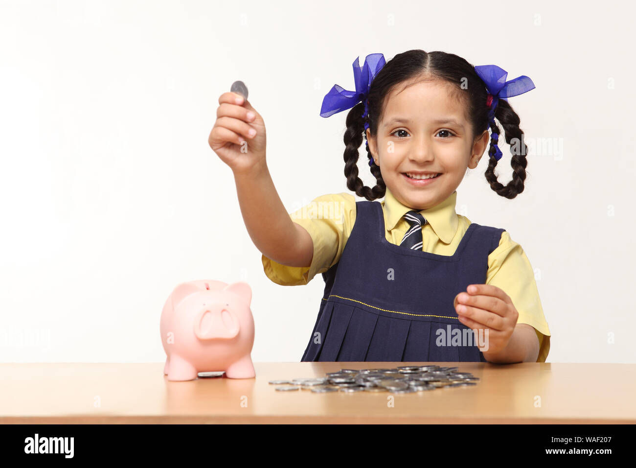 Schoolgirl showing her pocket money Stock Photo - Alamy