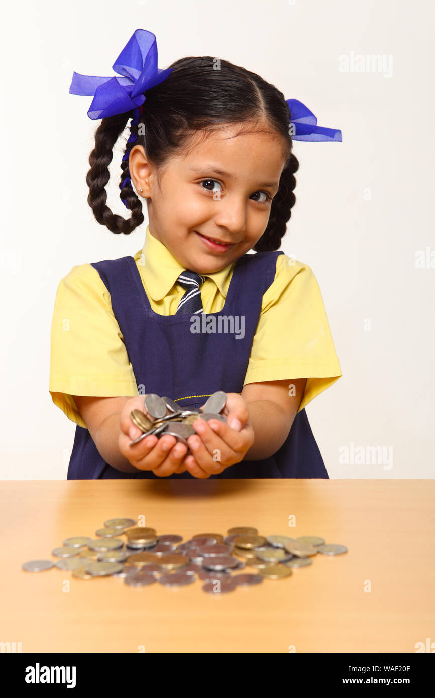 Schoolgirl showing her pocket money Stock Photo - Alamy