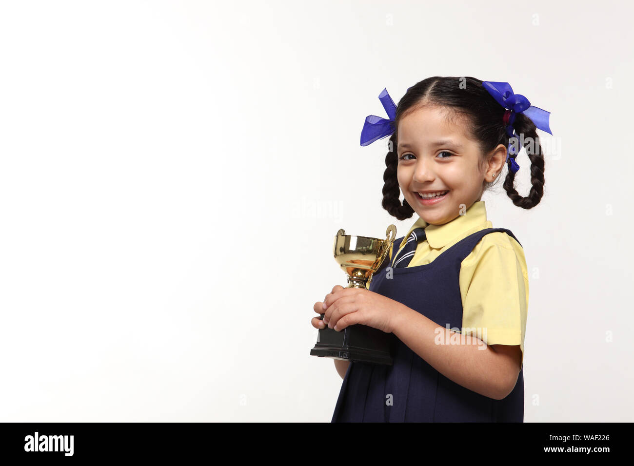 Smiling Trophy High Resolution Stock Photography and Images - Alamy