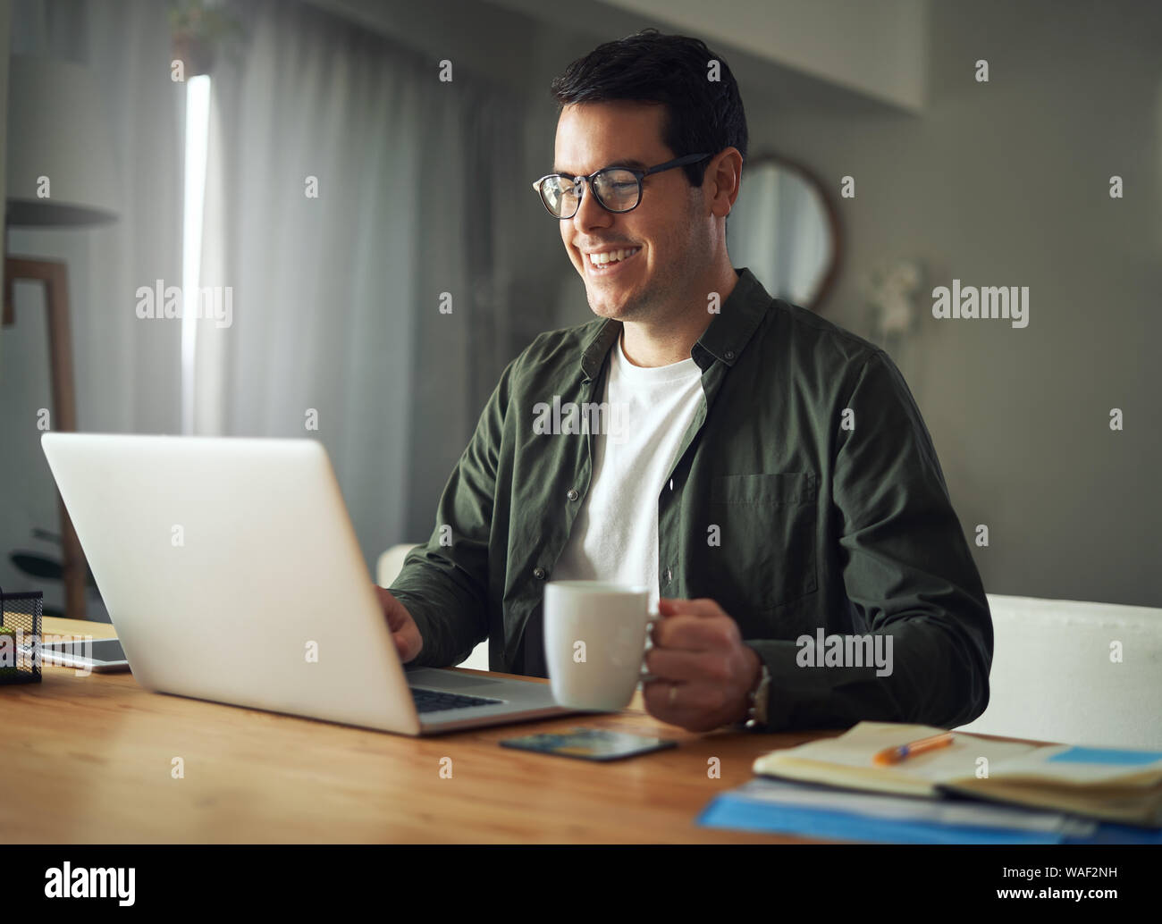 Laptop breakfast man hi-res stock photography and images - Alamy