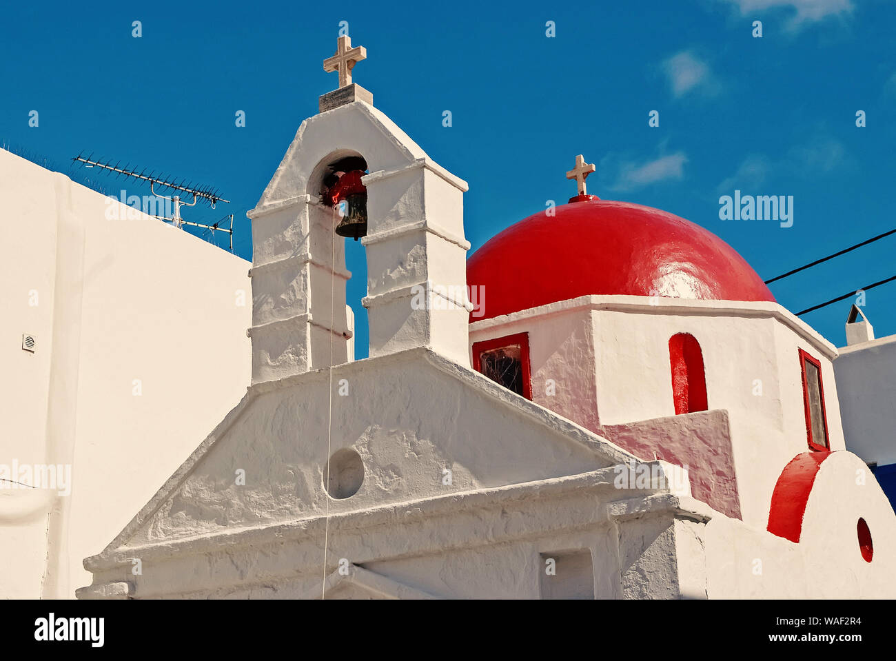 White church architecture in Mykonos, Greece. Chapel with bell tower ...
