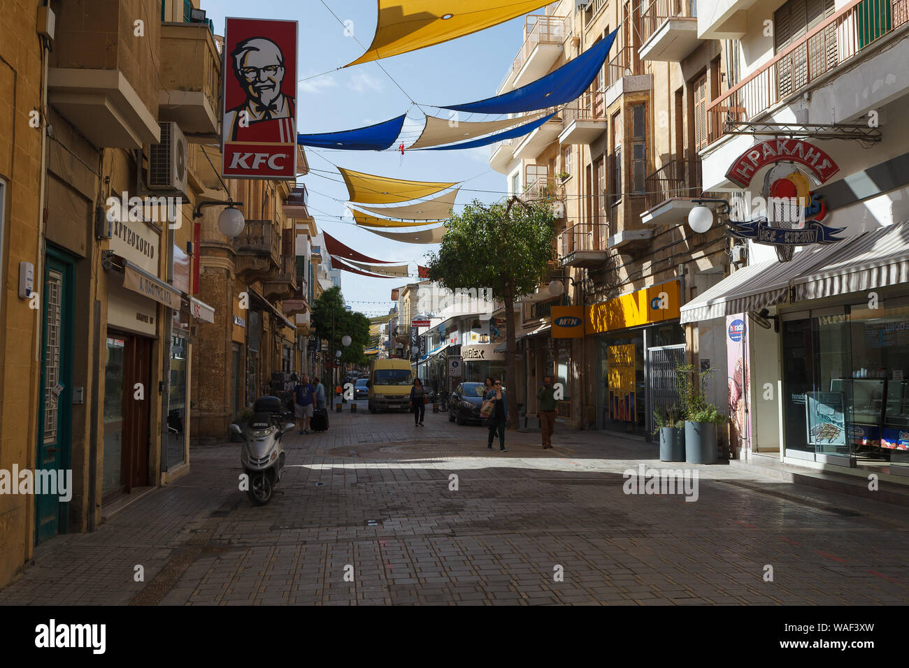 NICOSIA, CYPRUS - MARCH, 29, 2018: Nicosia City View. Street with shops ...