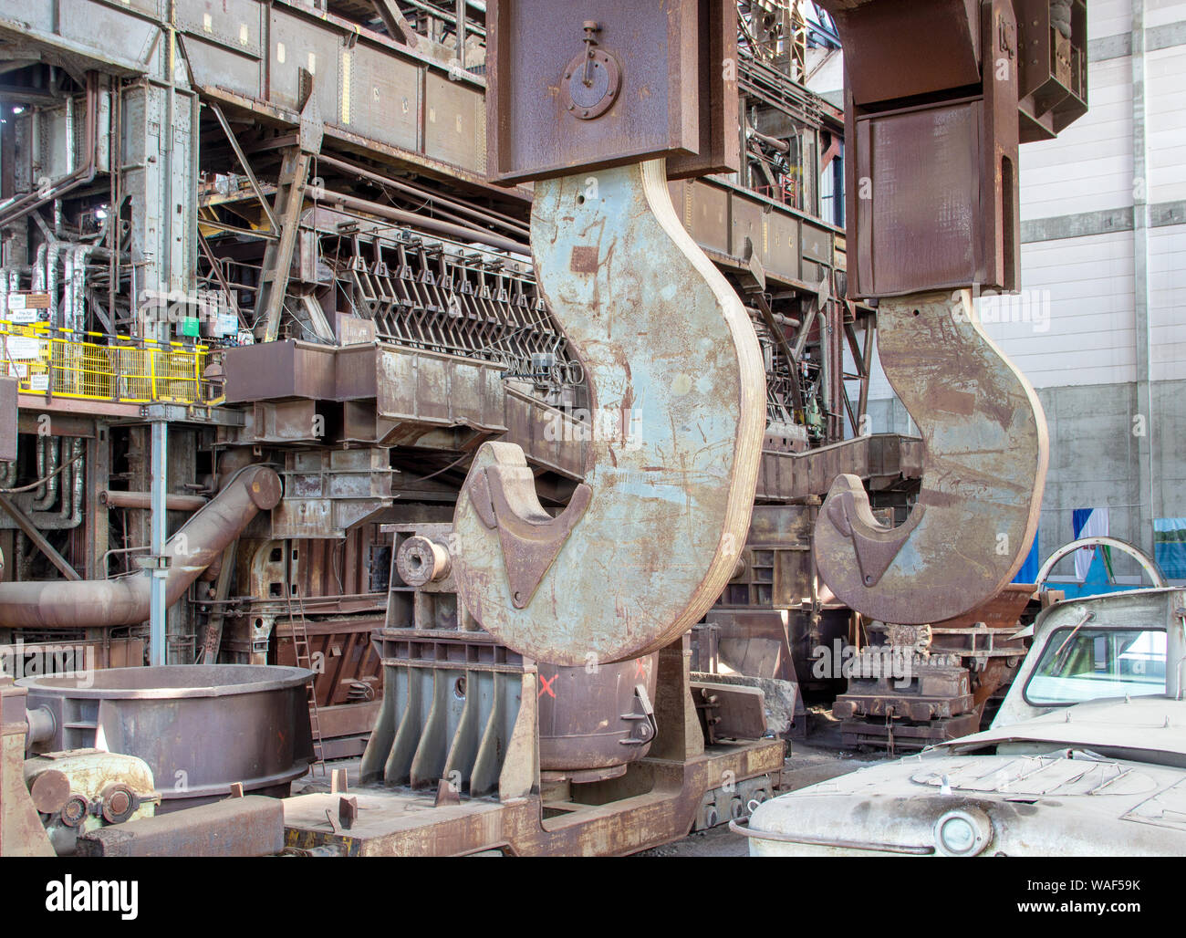 View on a big hooks of a crane Stock Photo - Alamy