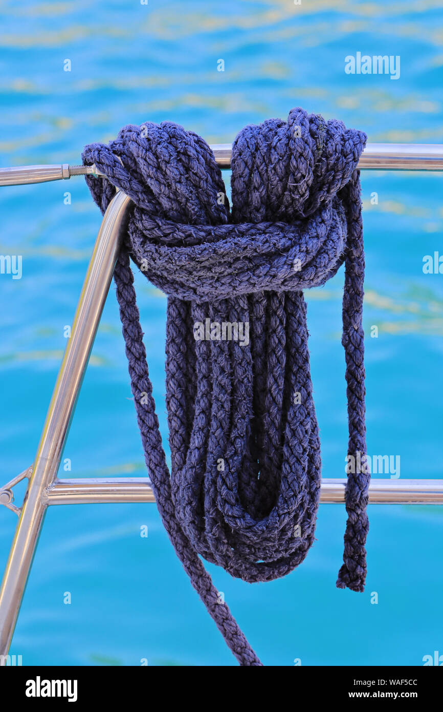 Yachting rope on the guard rail on the sailing yacht close up Stock ...