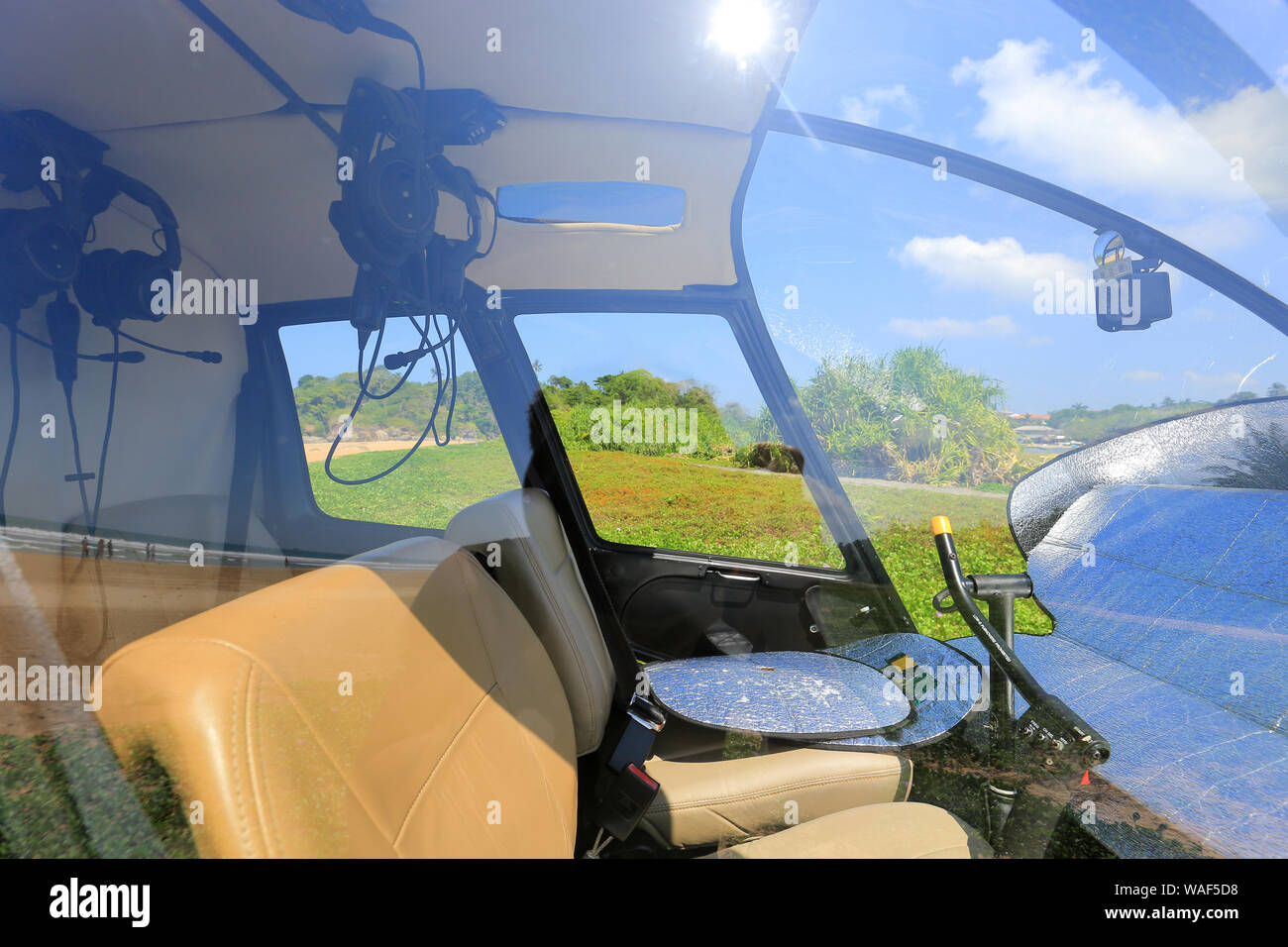 White helicopter cabin on the beach Stock Photo - Alamy