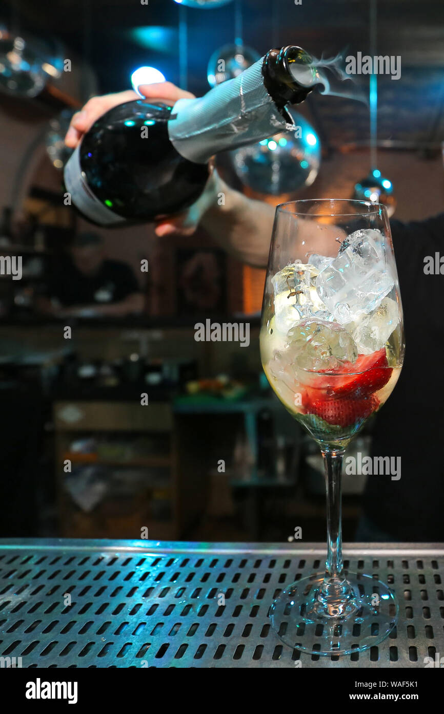bartender makes cocktail at night club Stock Photo - Alamy