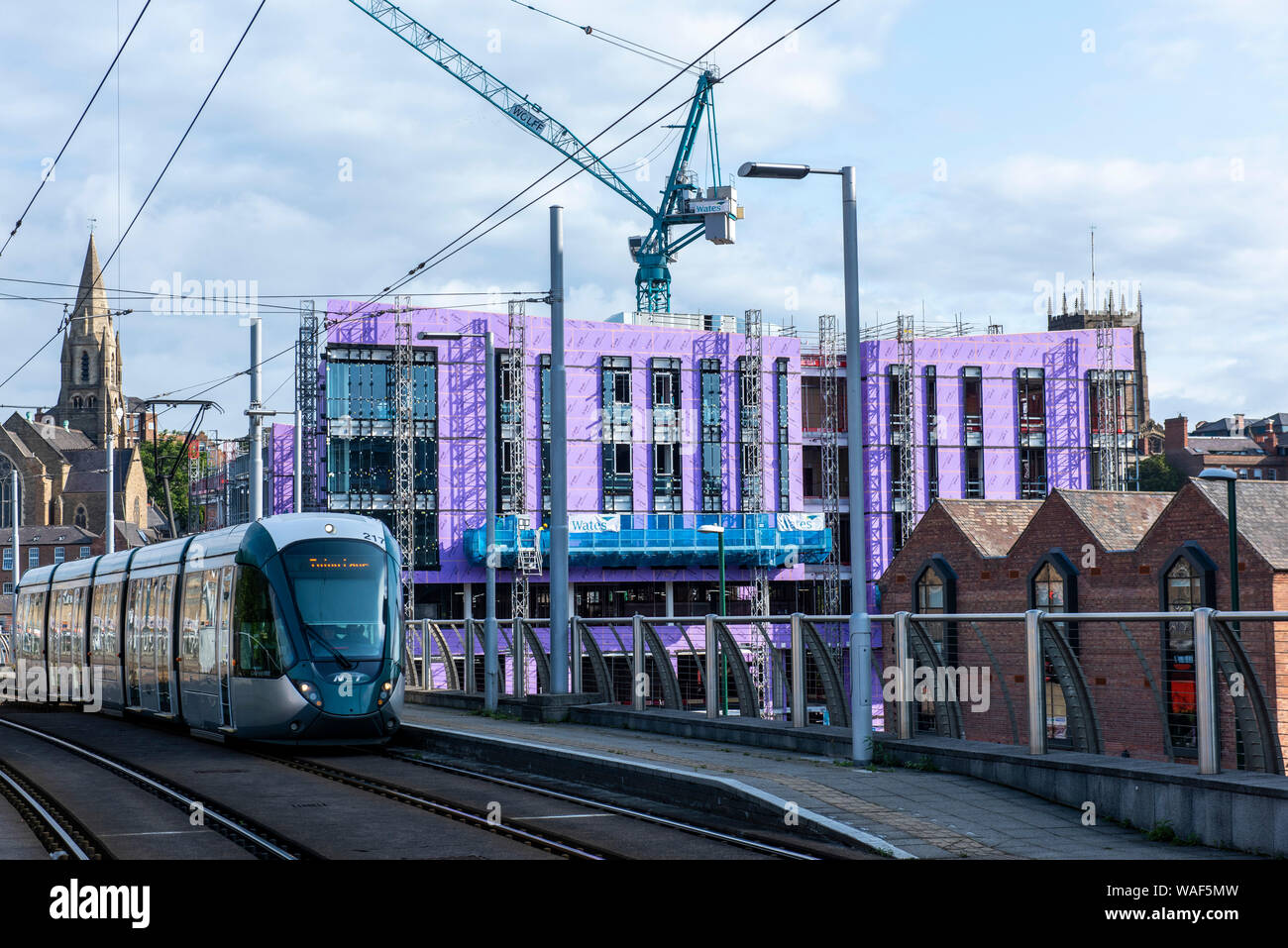 A Tram passing the new City Hub, Nottingham City Centre Nottinghamshire ...