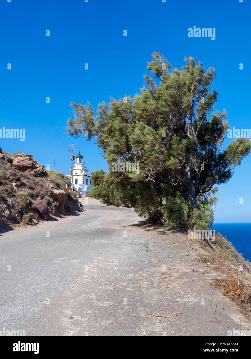 Akrotiri Lighthouse (Faros) with clear sky - Santorini Greece Stock ...