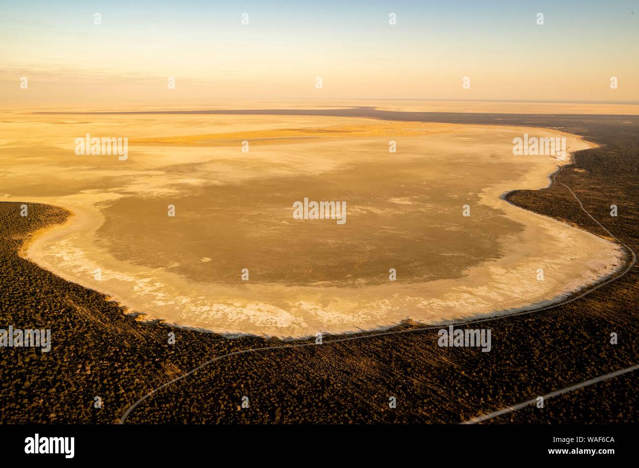 Aerial view, dried-out salt lake, eastern edge of the Etosha Pan ...