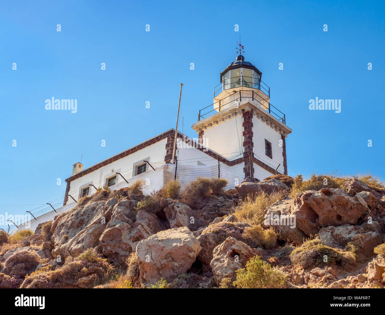 Akrotiri Lighthouse (Faros) with clear sky - Santorini Greece Stock ...