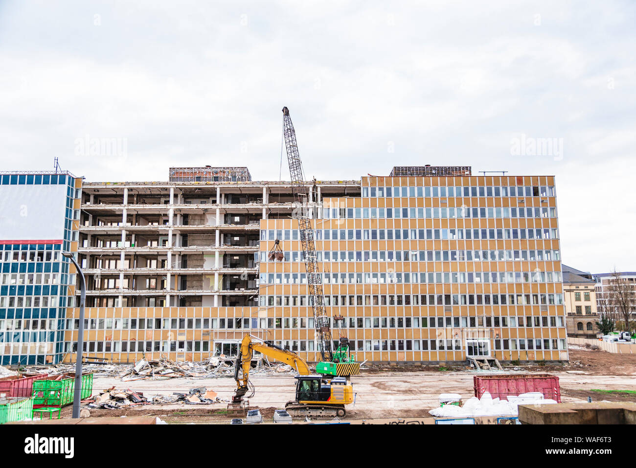 Construction site with office building under demolition Stock Photo - Alamy
